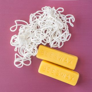 How to put a wick in a candle using no special candle-making tools