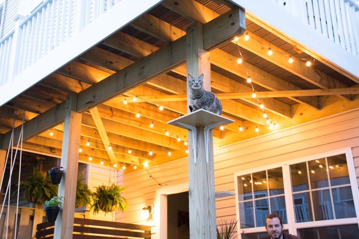 How to Hang Gorgeous Globe String Lights Under a Deck