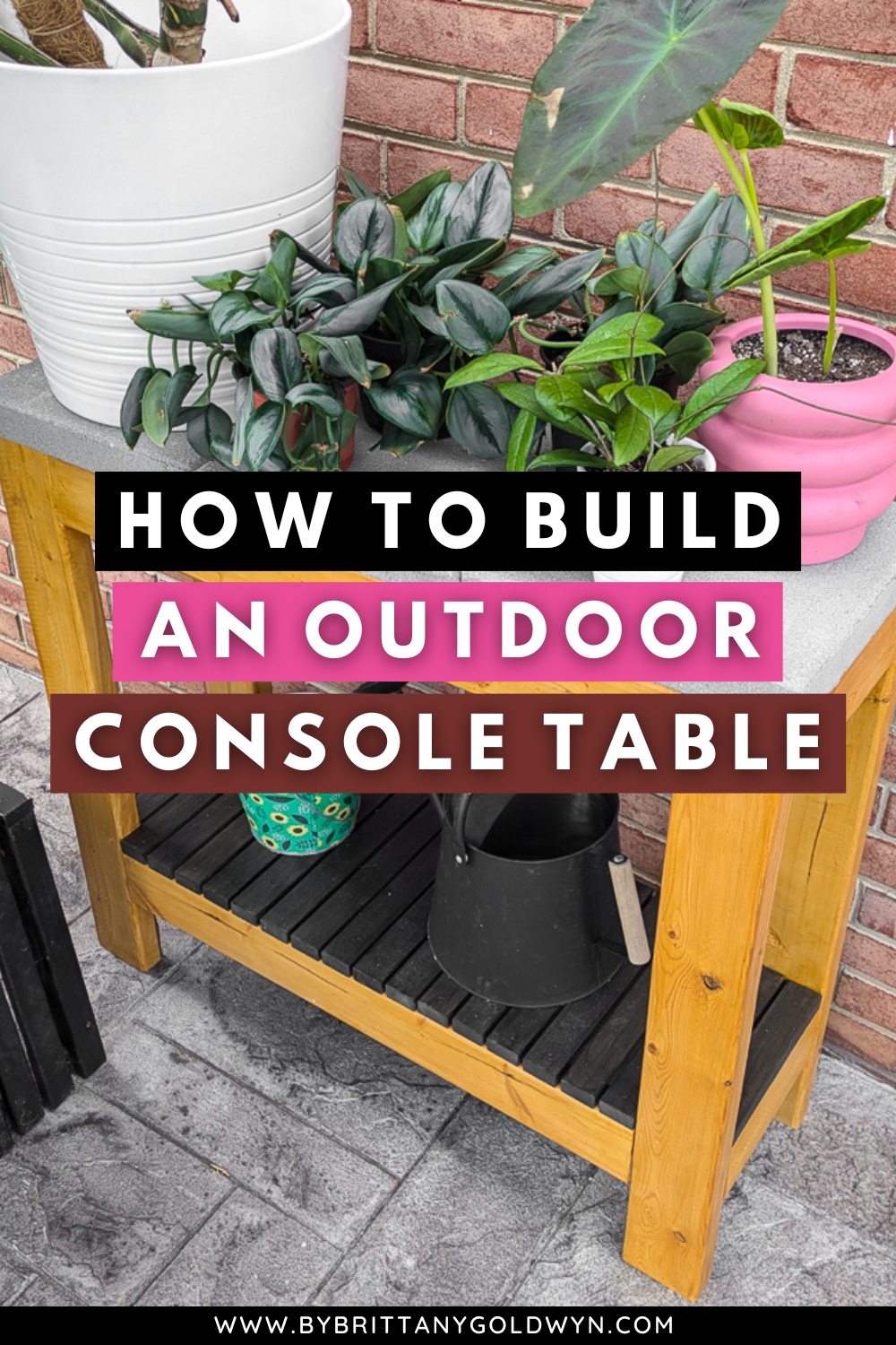 My outdoor console table made using 2x4s and pavers!